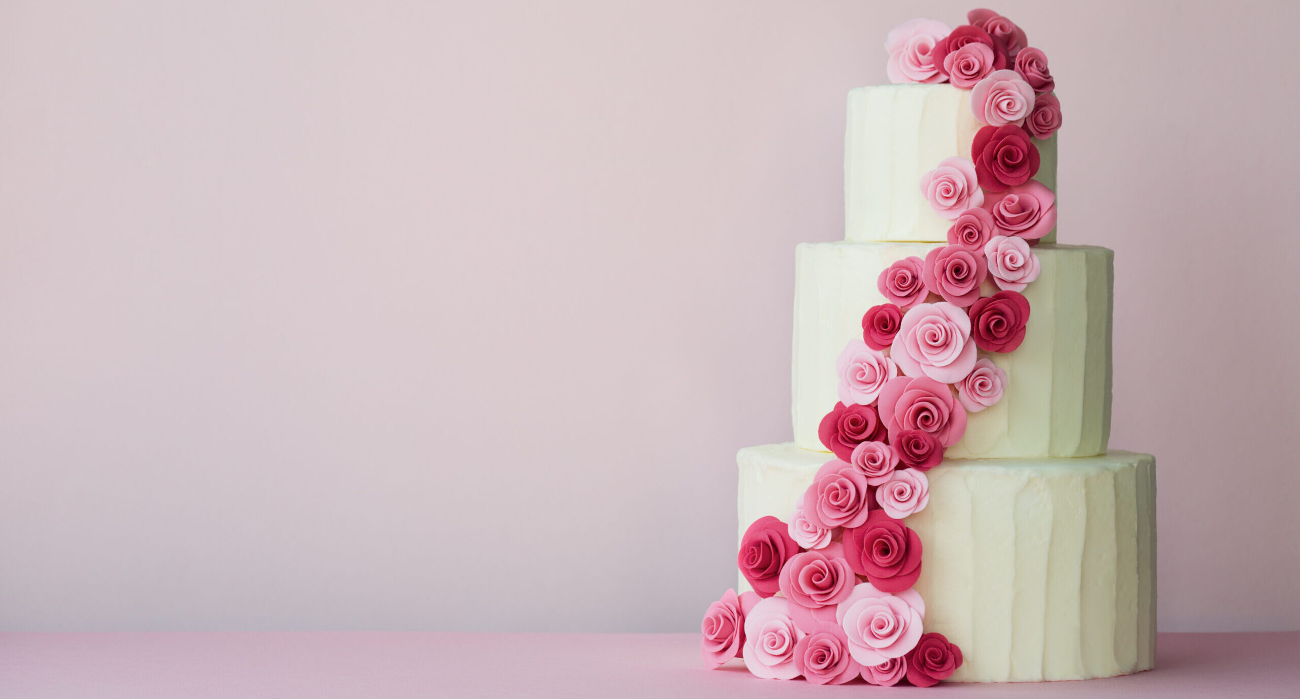 Tiered wedding cake with sugarpaste roses – Slice O Cake